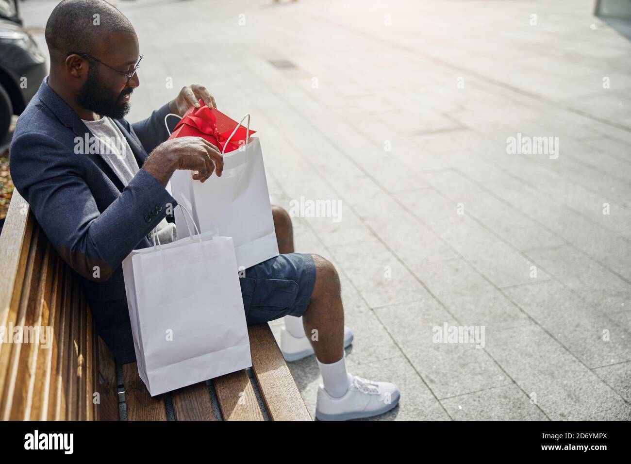 picture of handsome man with shopping bags Stock Photo - Alamy