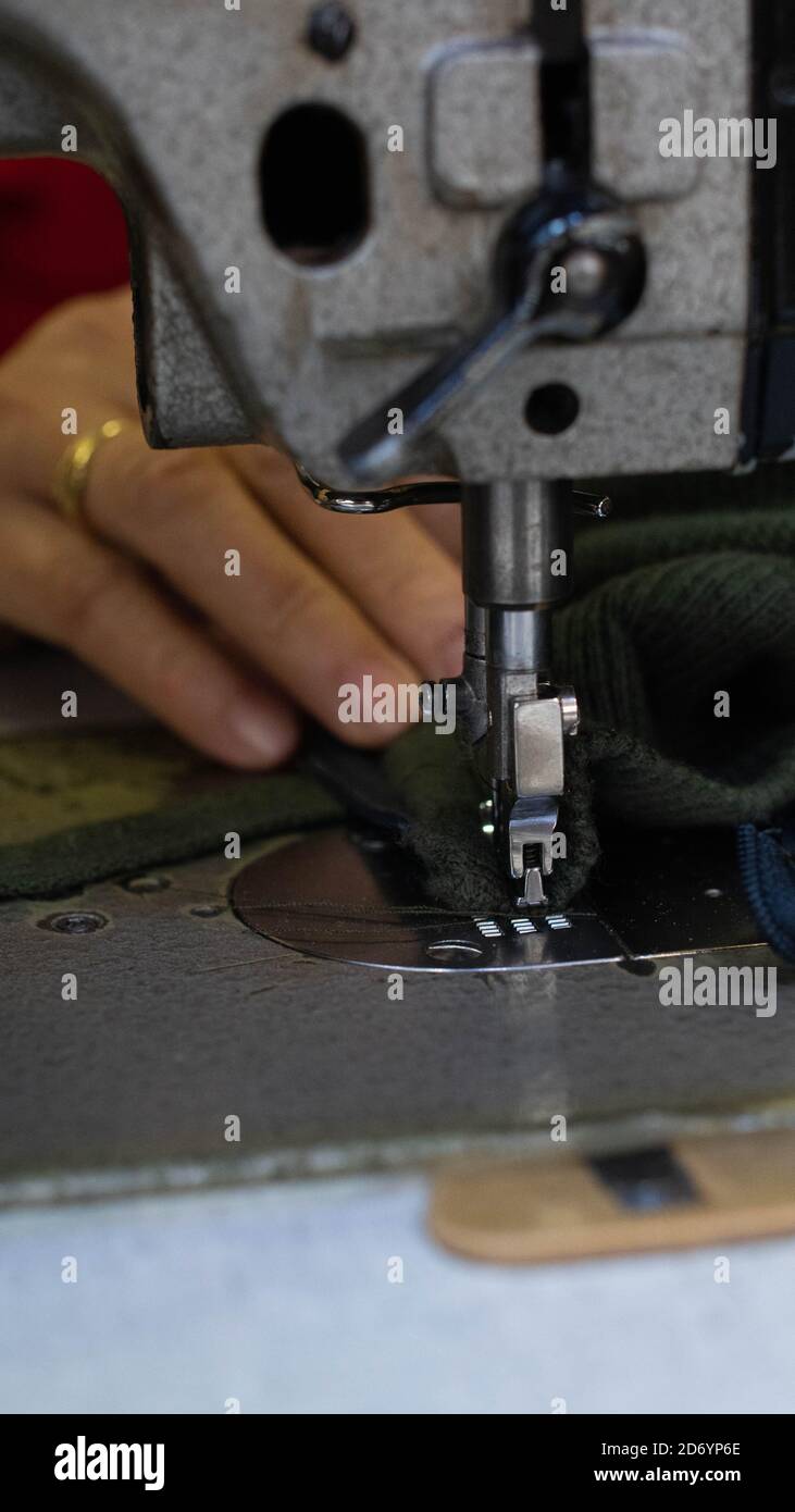 sewing machine fixing some clothes Stock Photo - Alamy