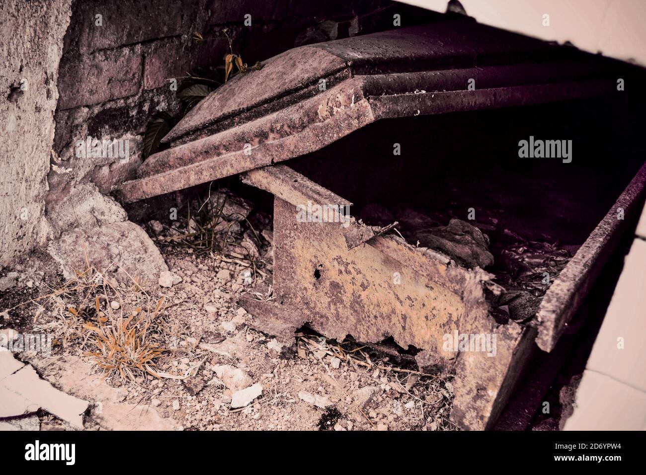 Old half opened rusty chest under wall built out of bricks Stock Photo ...