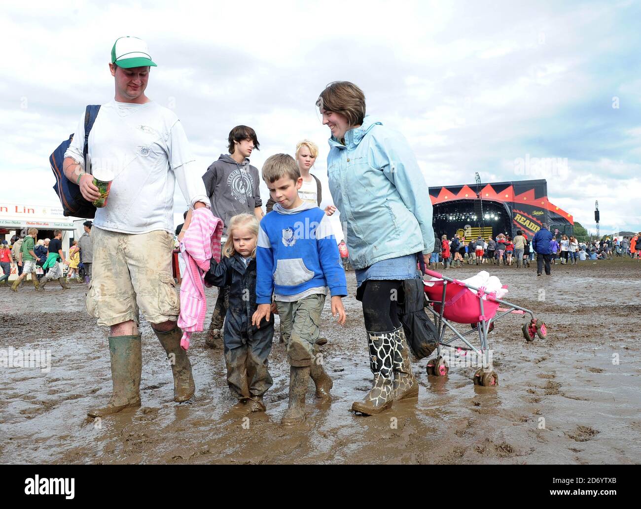 Mud on the first day of the Reading Festival in Berkshire Stock Photo ...