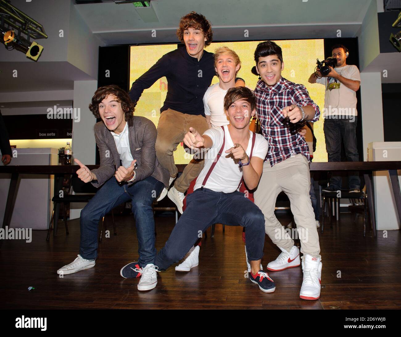 One Direction pictured in HMV Oxford Street, central London, where they ...