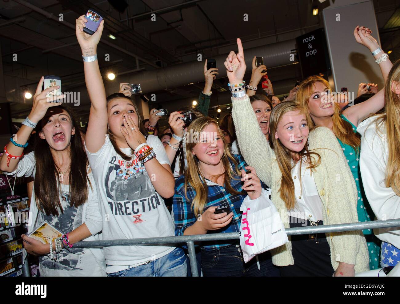 One Direction fans pictured in HMV Oxford Street, central London, where ...