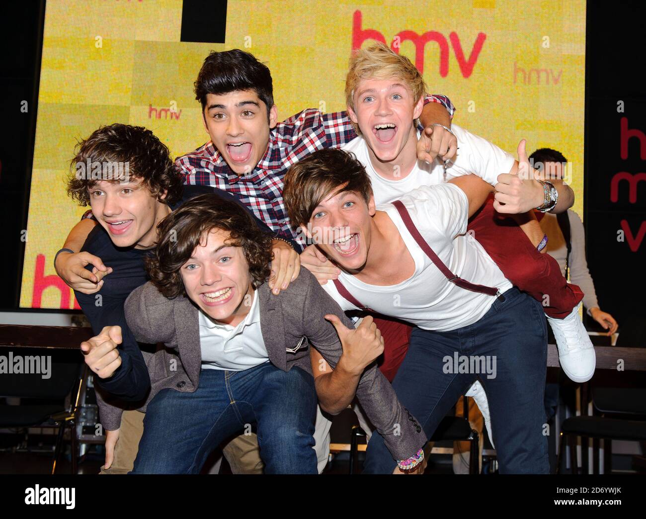 One Direction pictured in HMV Oxford Street, central London, where they ...