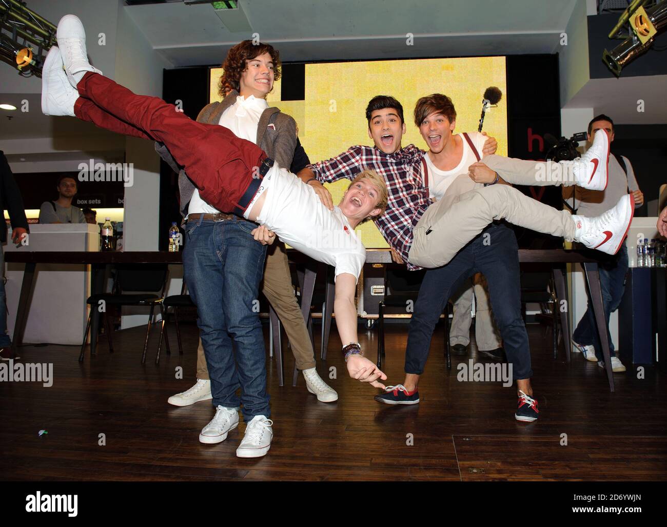 One Direction pictured in HMV Oxford Street, central London, where they ...