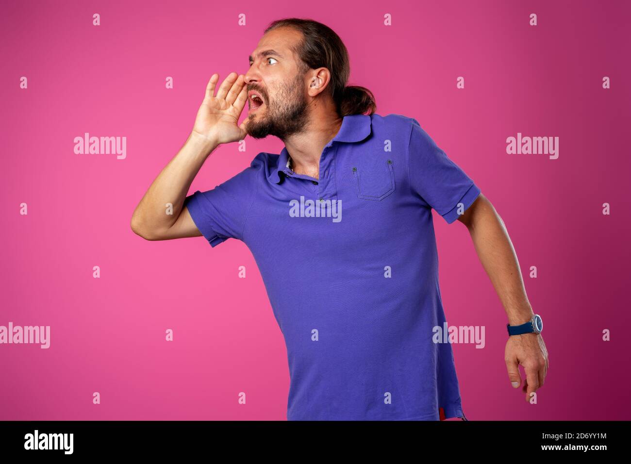 Very angry middle-aged man shouting against pink background Stock Photo ...