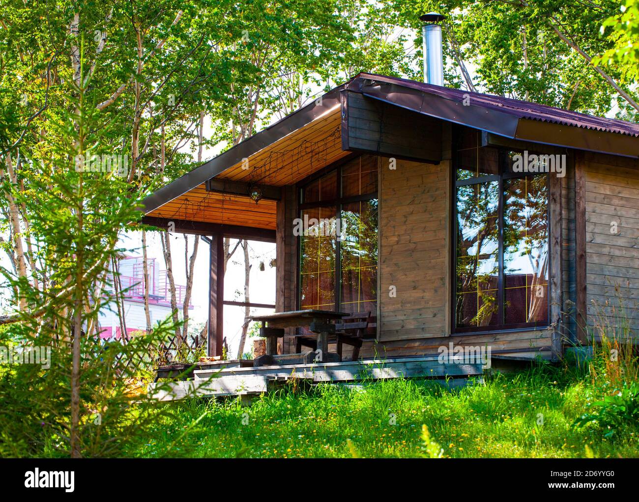 The single-storey wooden house in the woods Stock Photo - Alamy