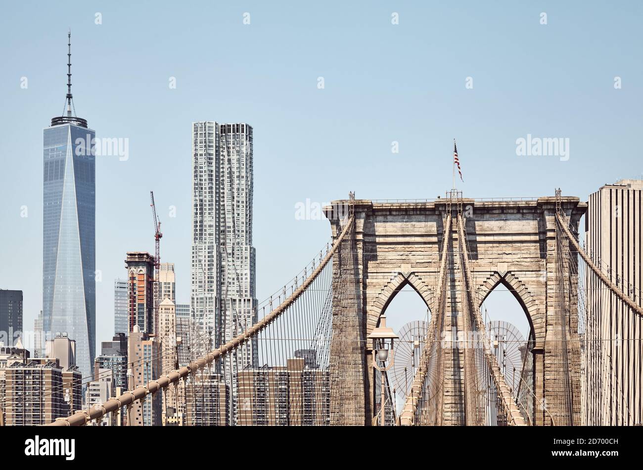 Brooklyn Bridge with Manhattan skyline in background, color toning ...