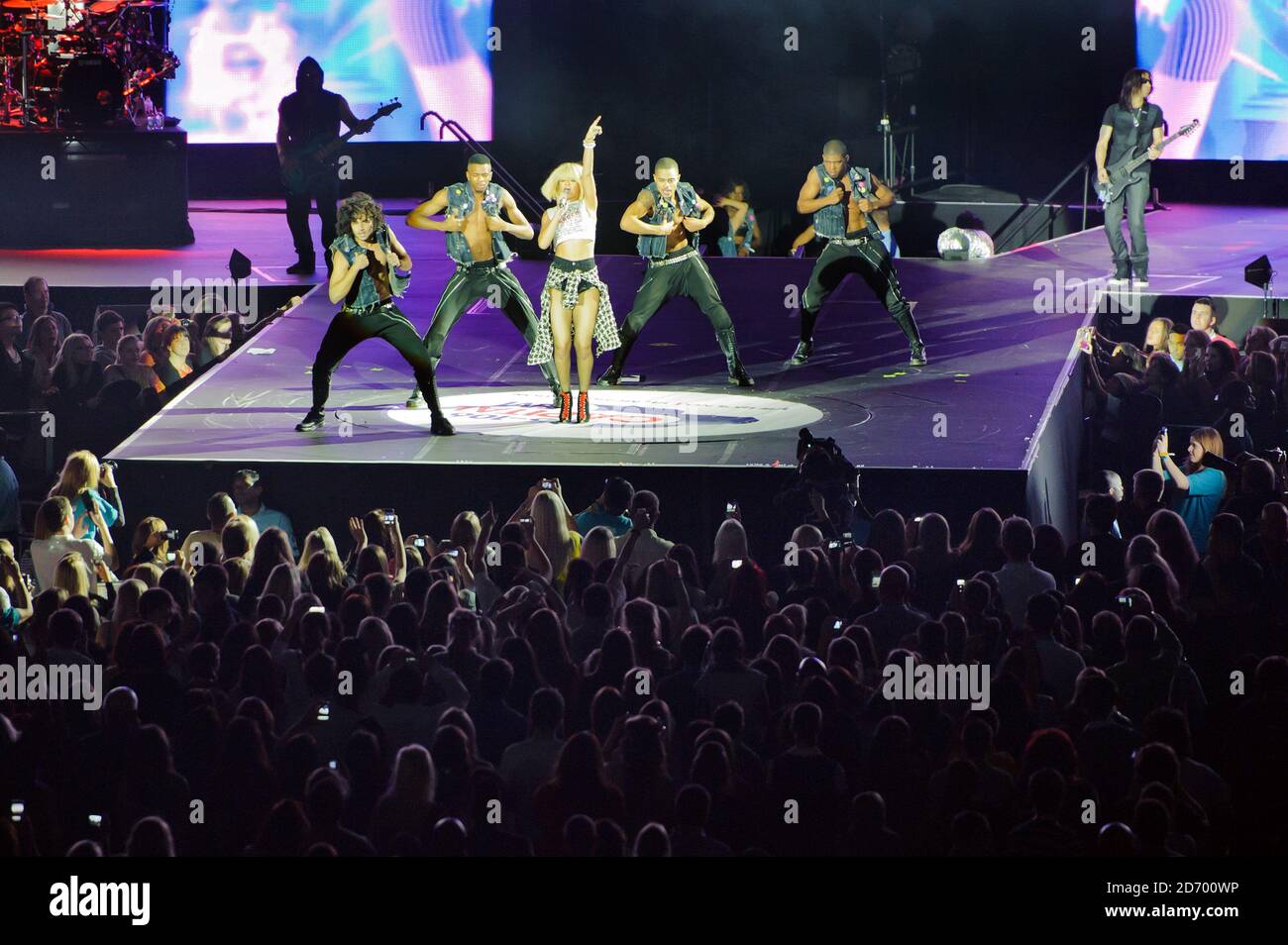 Rihanna performing at the Capital FM Jingle Bell Ball, at the O2 Arena ...
