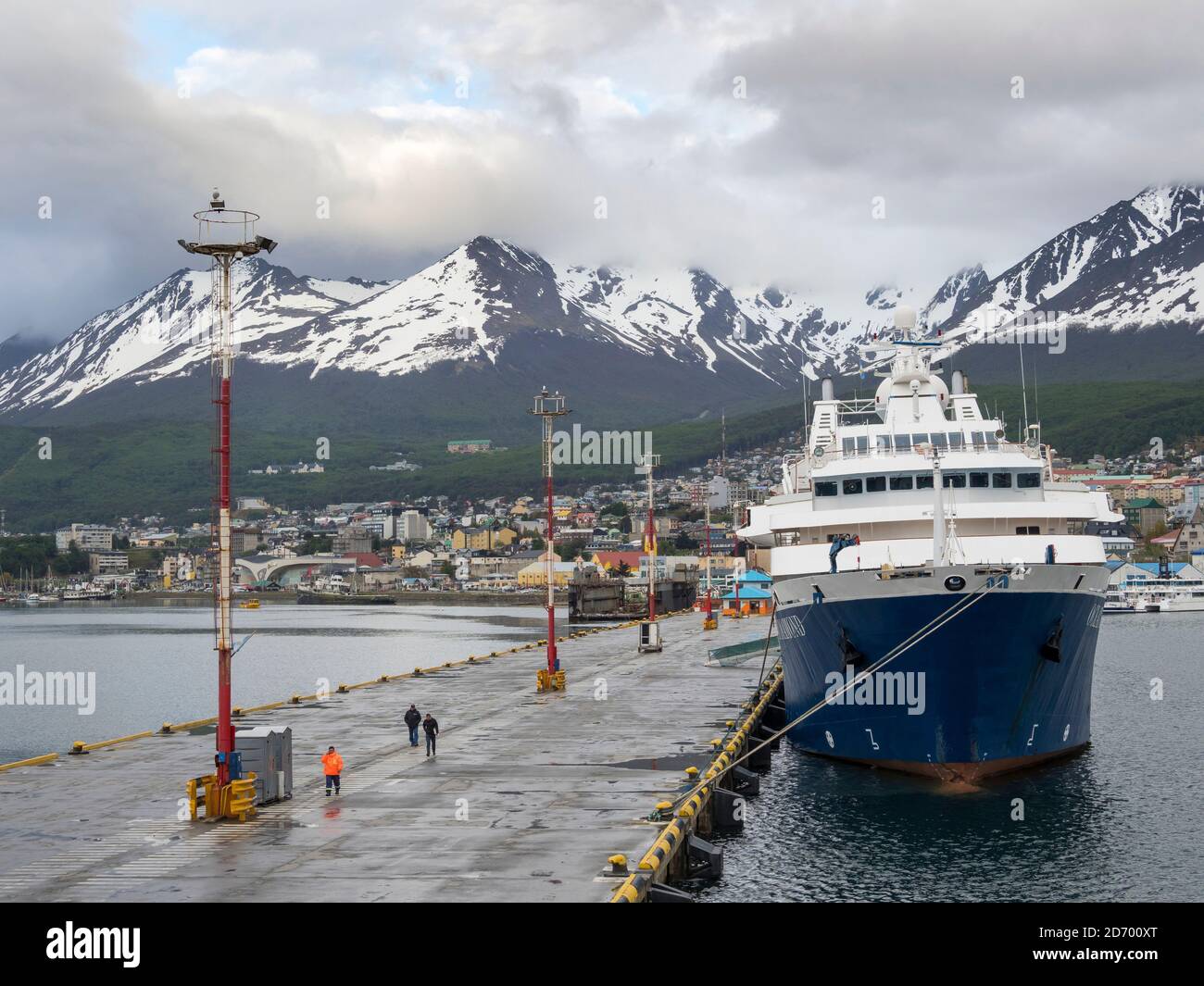 Town Ushuaia on Tierra del Fuego in Patagonia. The harbour facing the ...