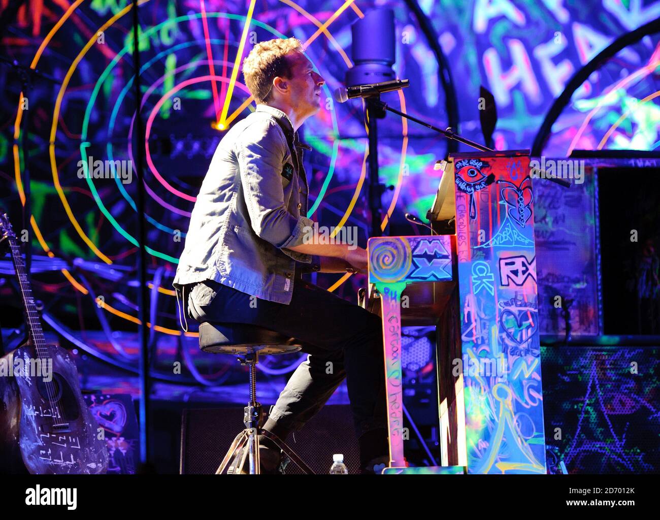 EDITORIAL USE ONLY NO MERCHANDISING Chris Martin of Coldplay performing ...