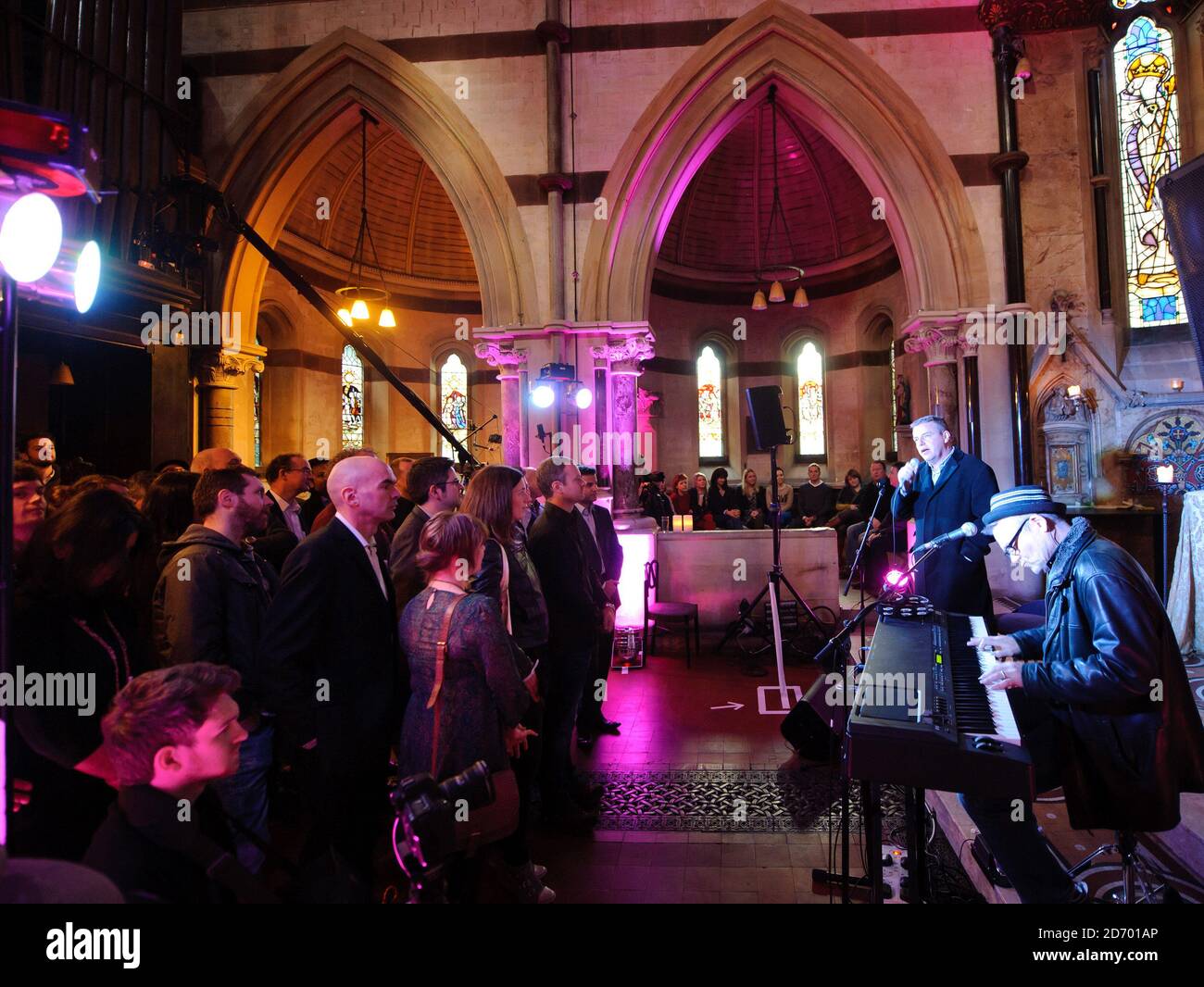 Suggs and Michael Barson of Madness performing at the Absolute Radio ...