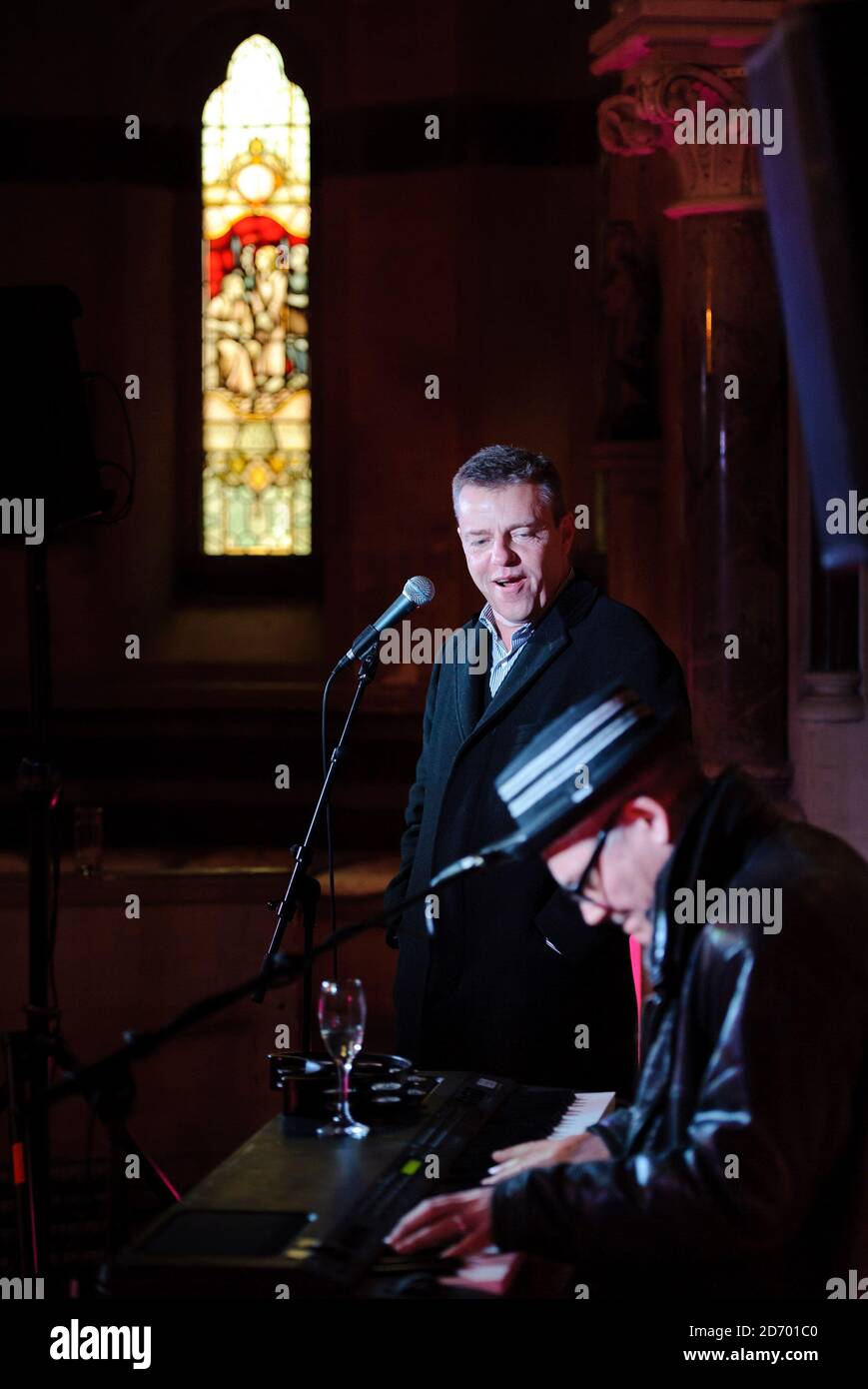 Suggs and Michael Barson of Madness performing at the Absolute Radio ...