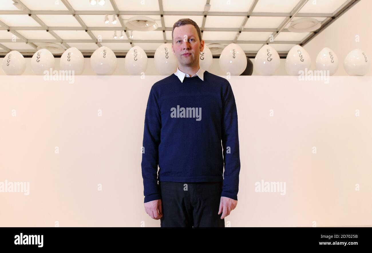 Artist David Shrigley pictured with his work Eggs, at the Hayward ...