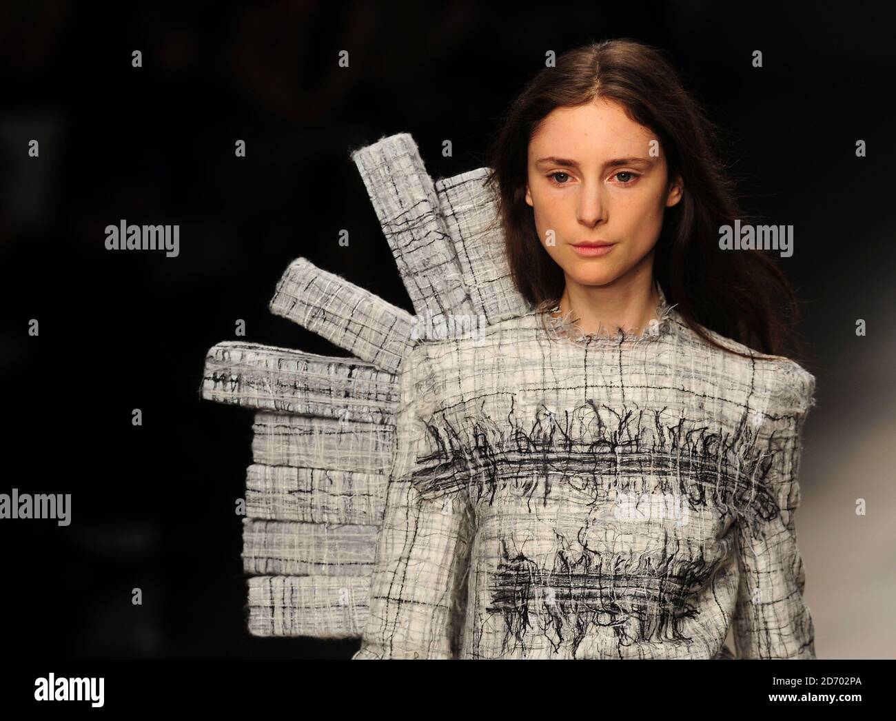 A model wears a creation by Hellen Van Rees at the Central St Martins ...