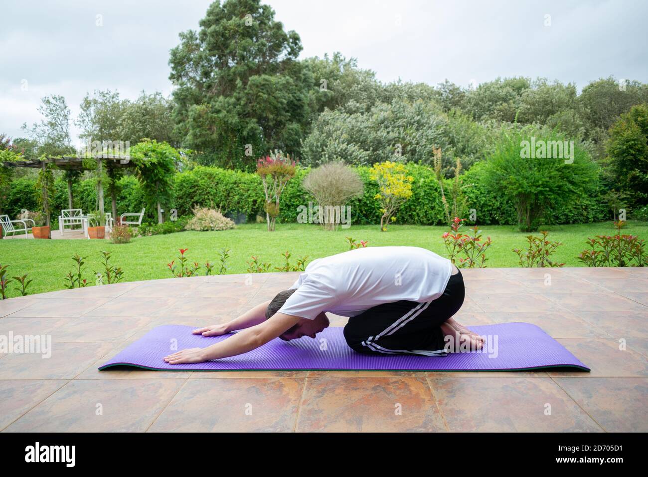 Man practicing childs pose hi-res stock photography and images - Alamy