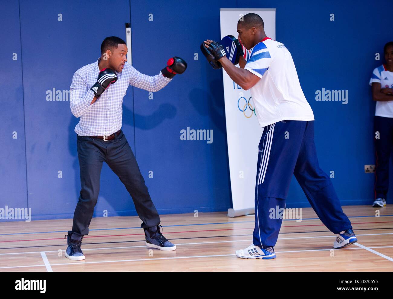 Will Smith takes part in a boxing demonstration with athlete Anthony ...
