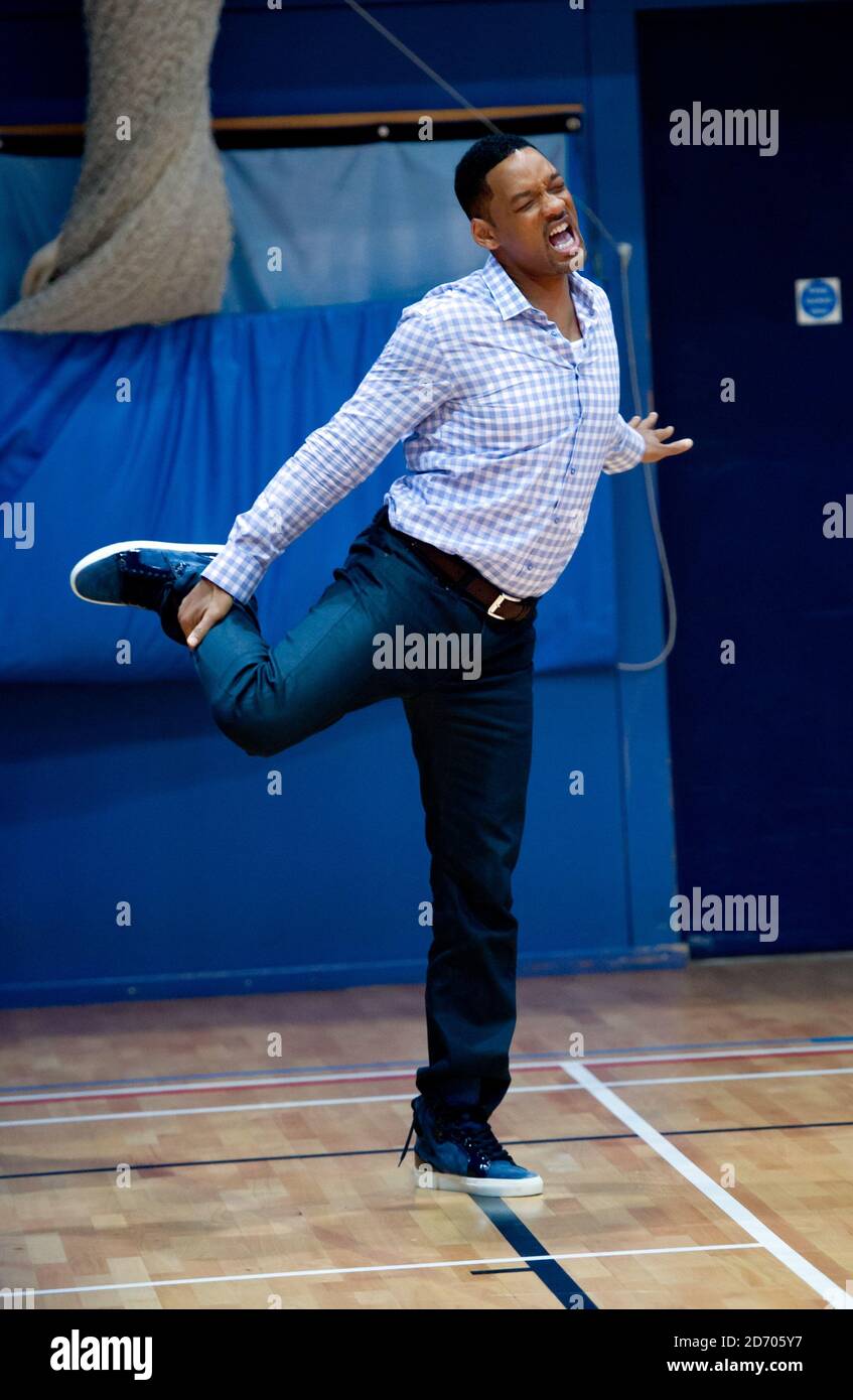 Will Smith takes part in a basketball demonstration with athlete Drew ...