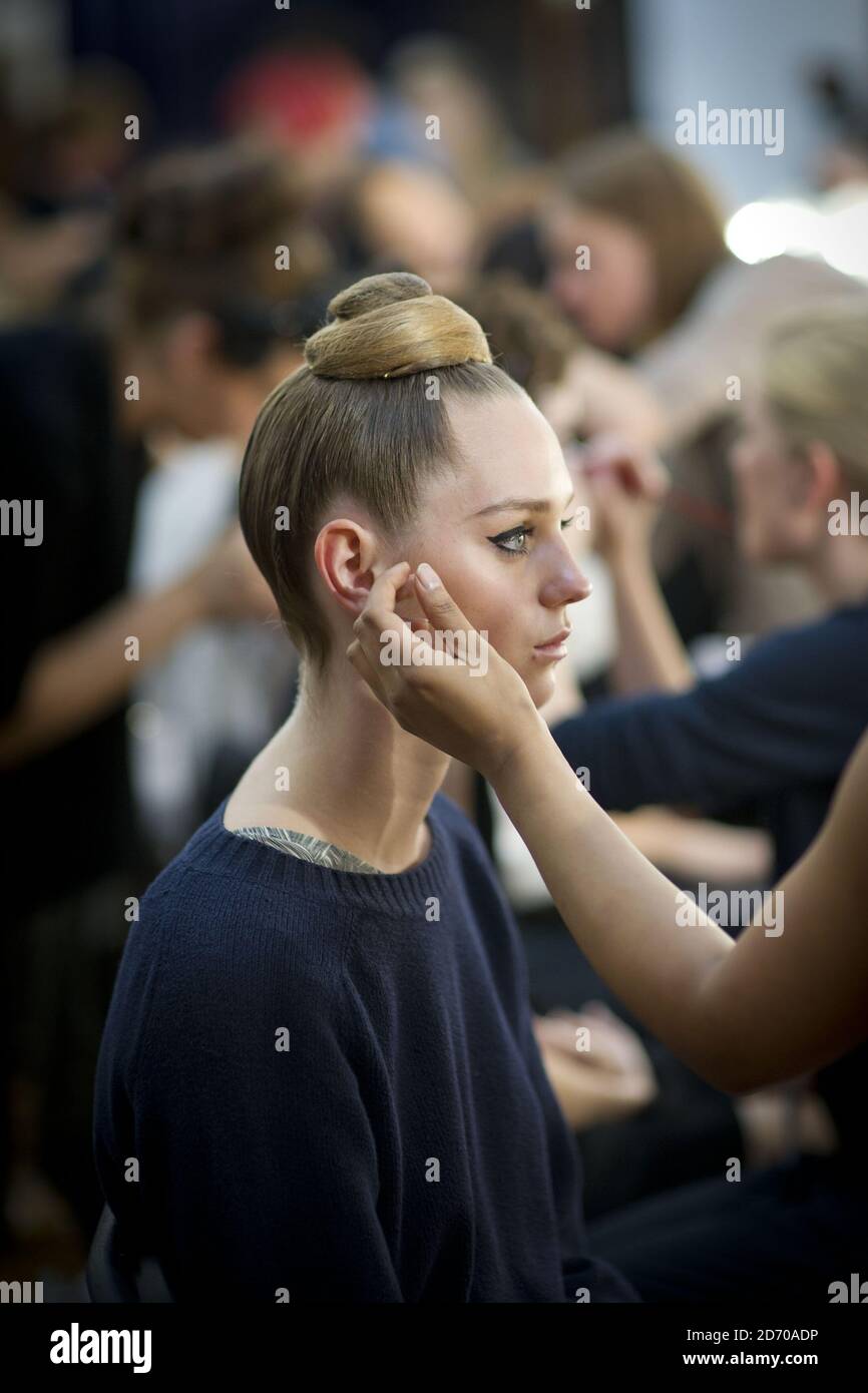 Models prepare backstage before the Temperley fashion show, held at the ...