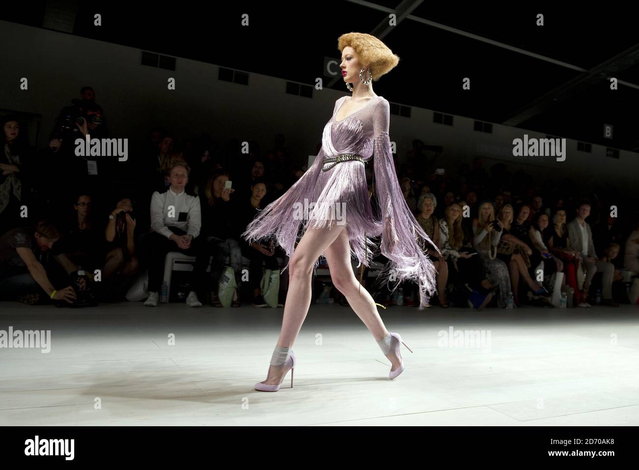 A model on the catwalk during the Mark Fast fashion show, held at the ...