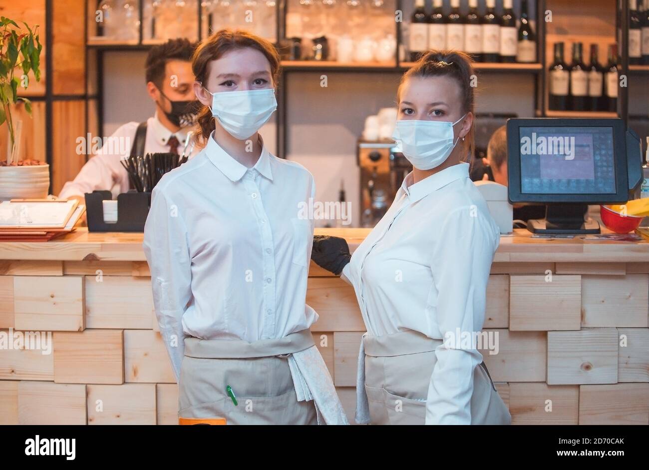work of staff wearing medical masks during a pandemic Stock Photo - Alamy