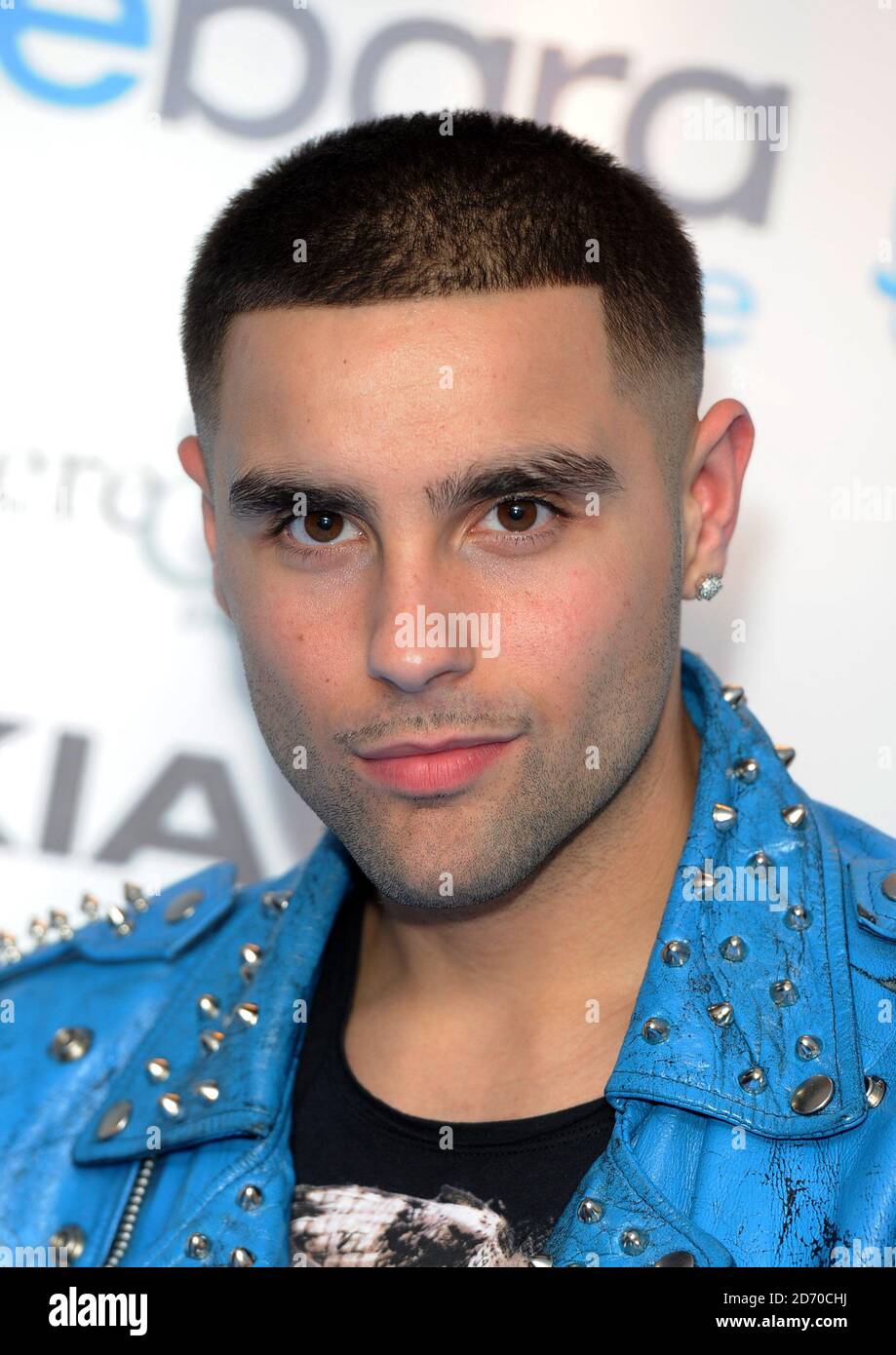 Shide Boss pictured with the best newcomer award, at the 2012 Asian ...