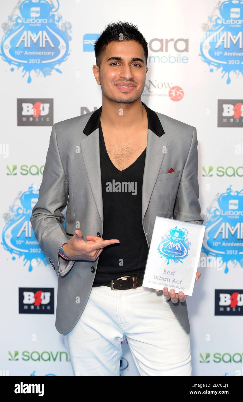 Arjun pictured with the best urban act award, at the 2012 Asian Music ...