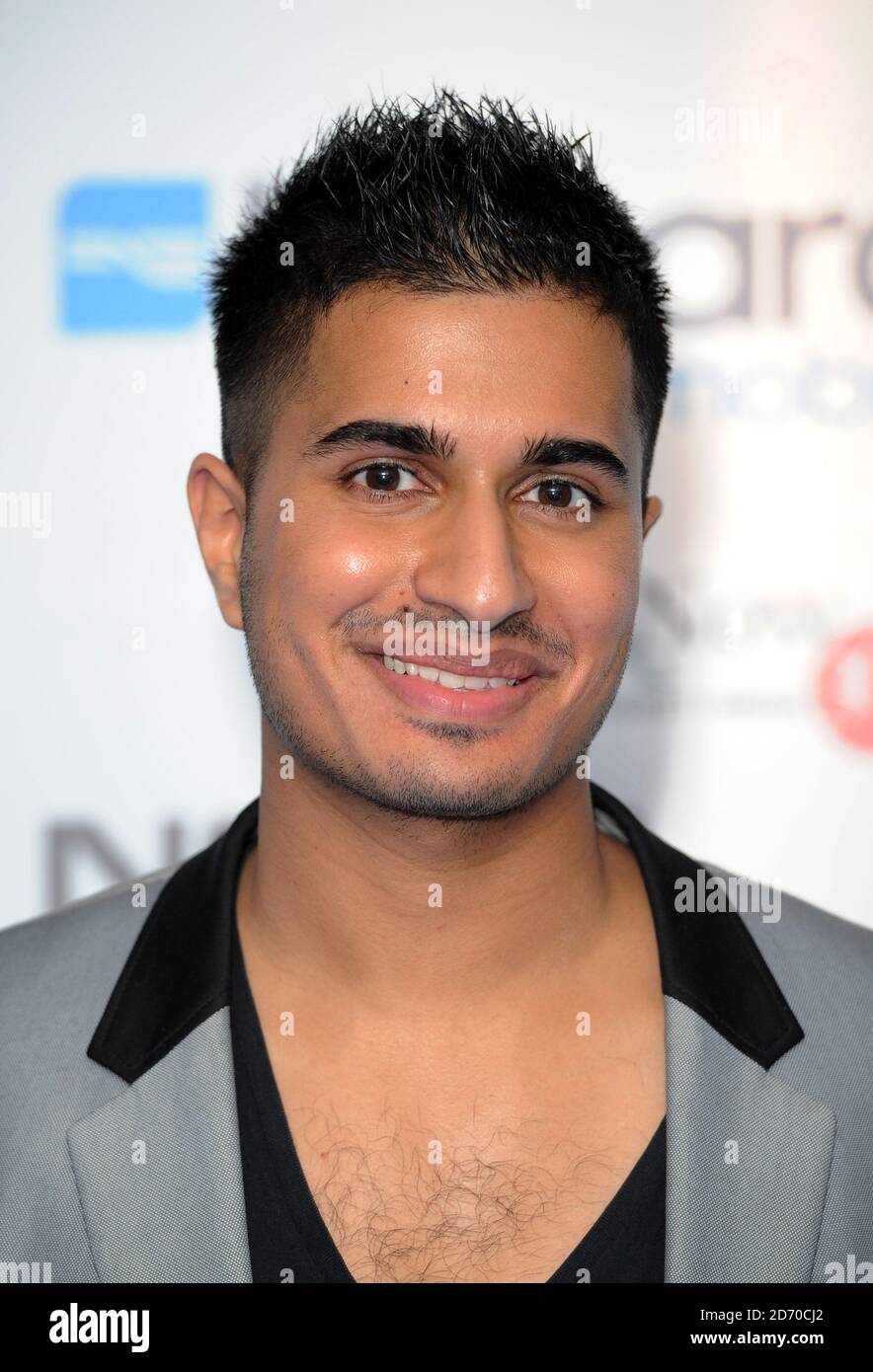 Arjun pictured with the best urban act award, at the 2012 Asian Music ...