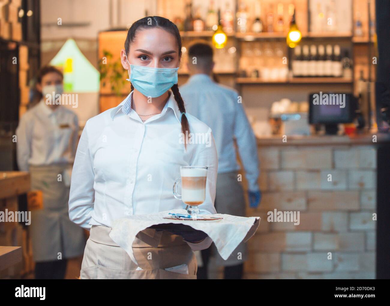 work of staff wearing medical masks during a pandemic Stock Photo - Alamy
