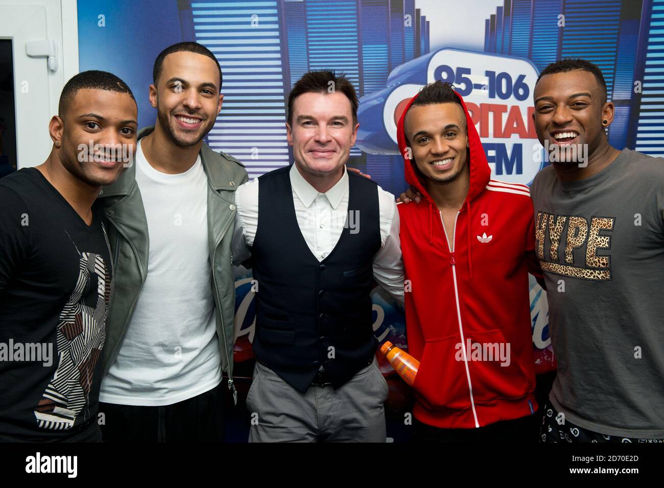 Presenter Greg Burns pictured with JLS backstage at Capital FM's Jingle ...