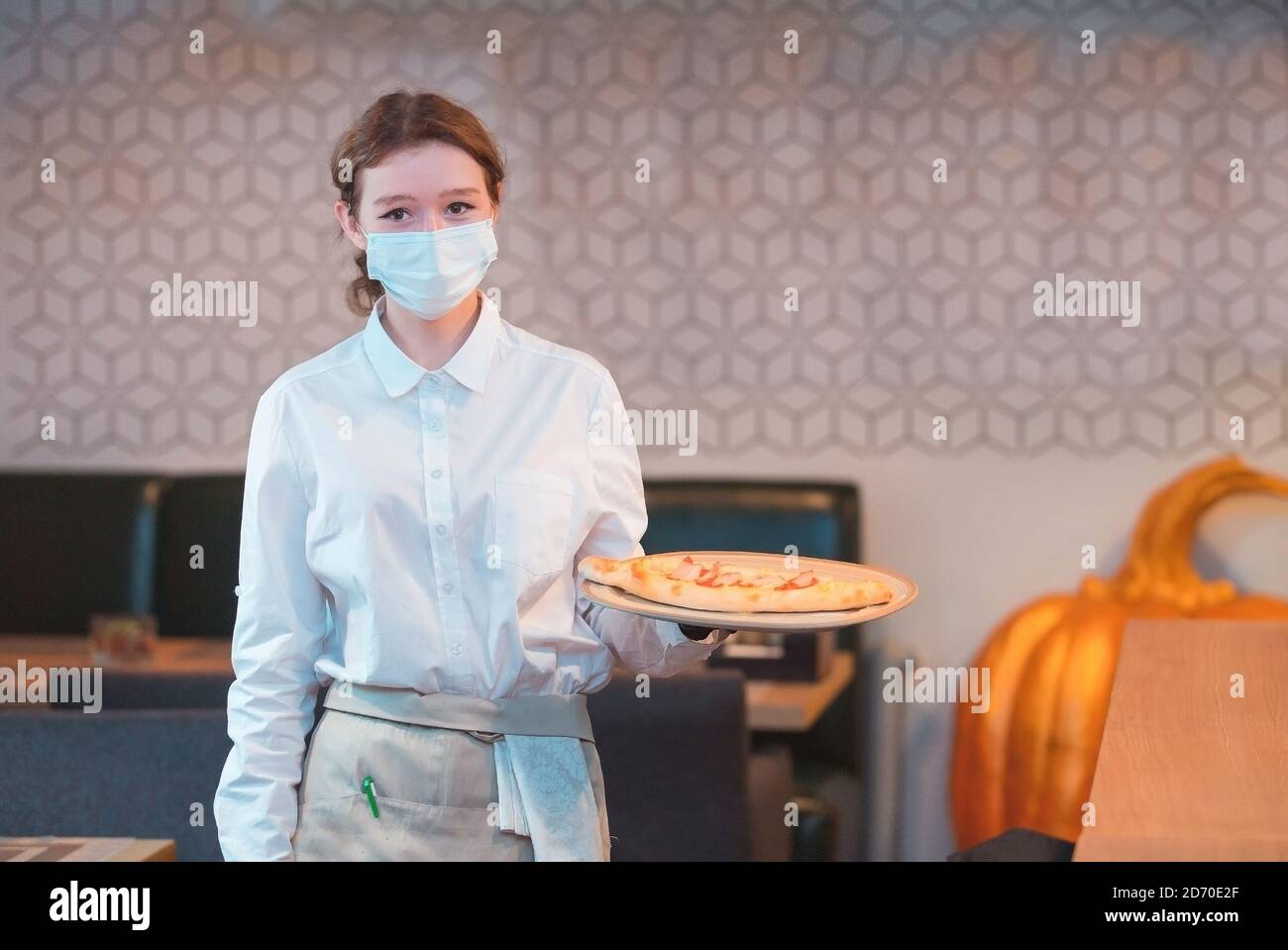 work of staff wearing medical masks during a pandemic Stock Photo - Alamy