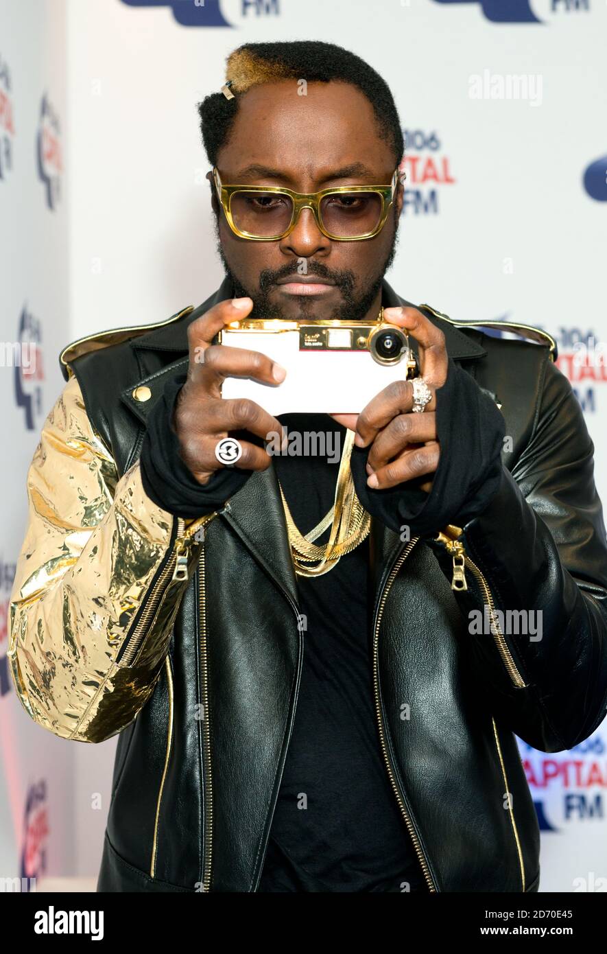 Will.i.am pictured backstage at Capital FM's Jingle Bell Ball, at the ...