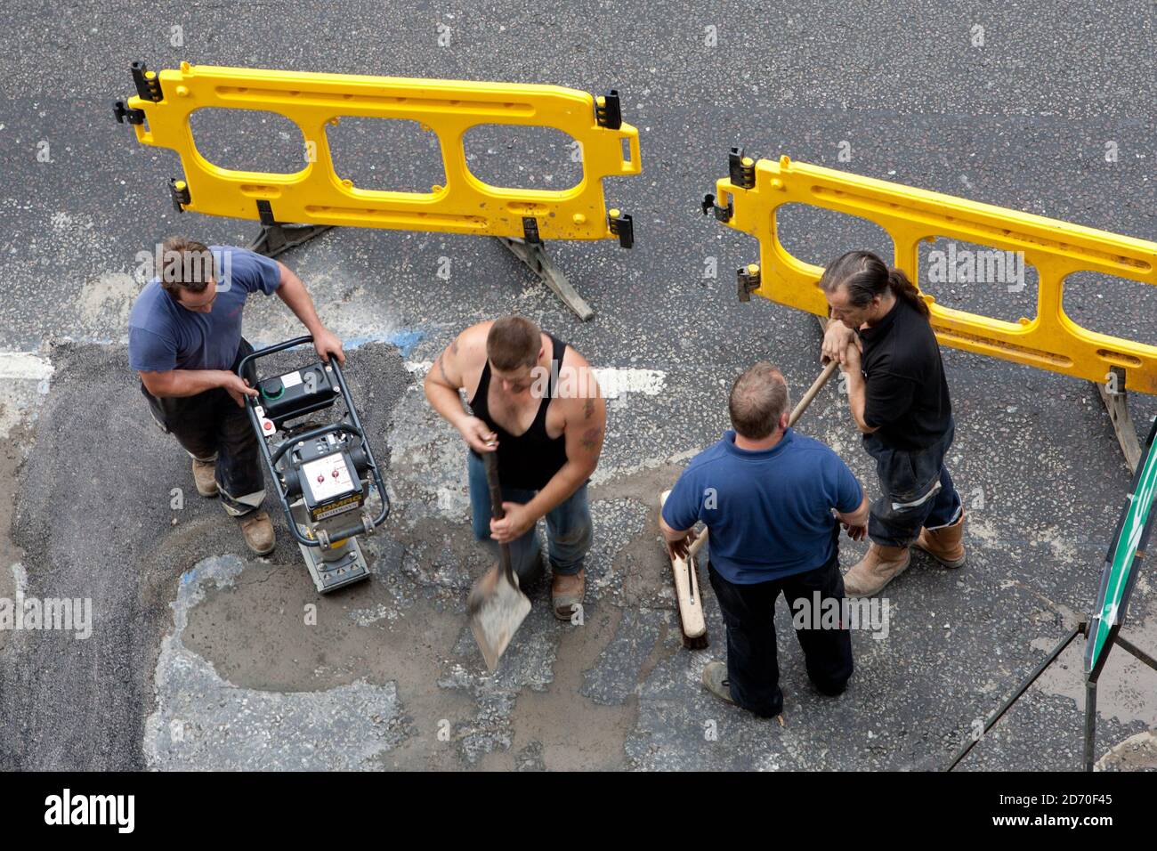 Road workers in the City of London Stock Photo - Alamy
