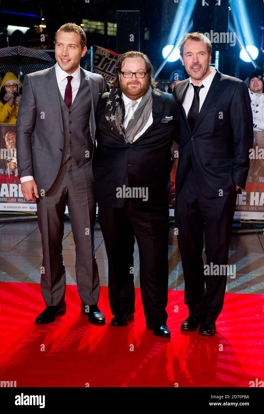 Jai Courtney, Bruce Willis and Sebastian Koch attending the premiere of ...