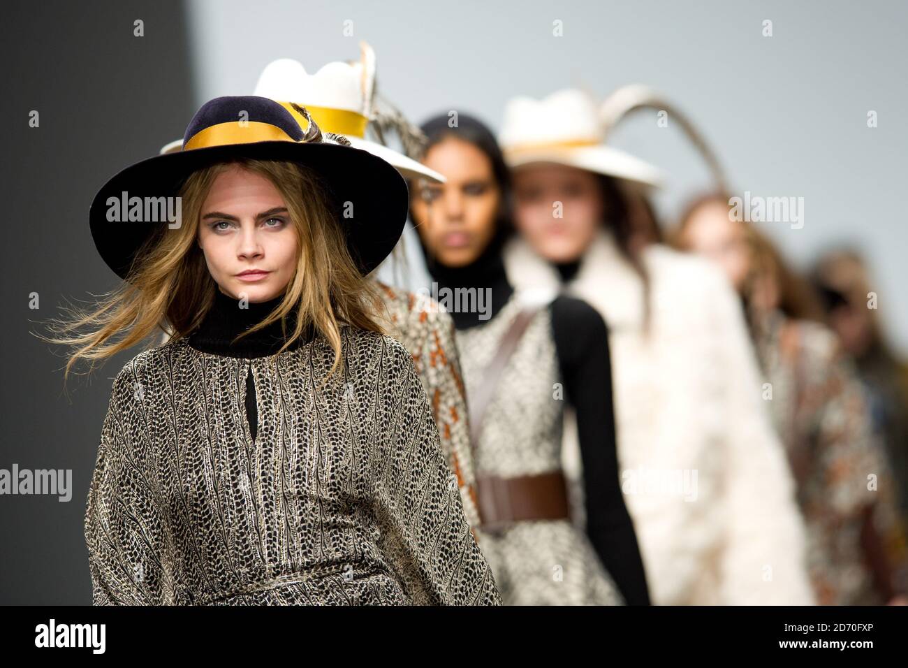 Cara Delevingne wears a creation by Issa, during the autumn/ winter ...