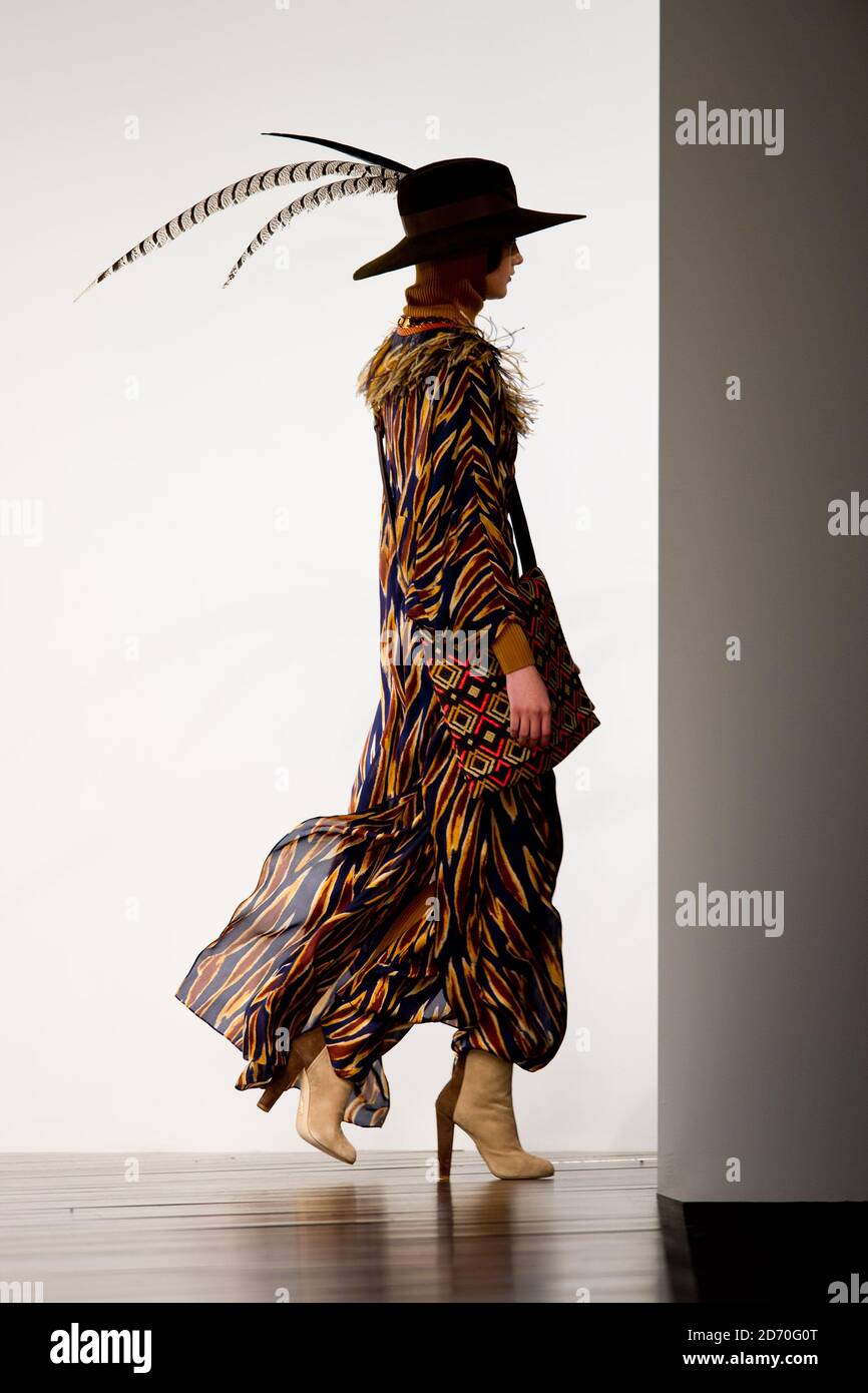 A Model wears a creation by Issa, during the autumn/ winter 2013 ...