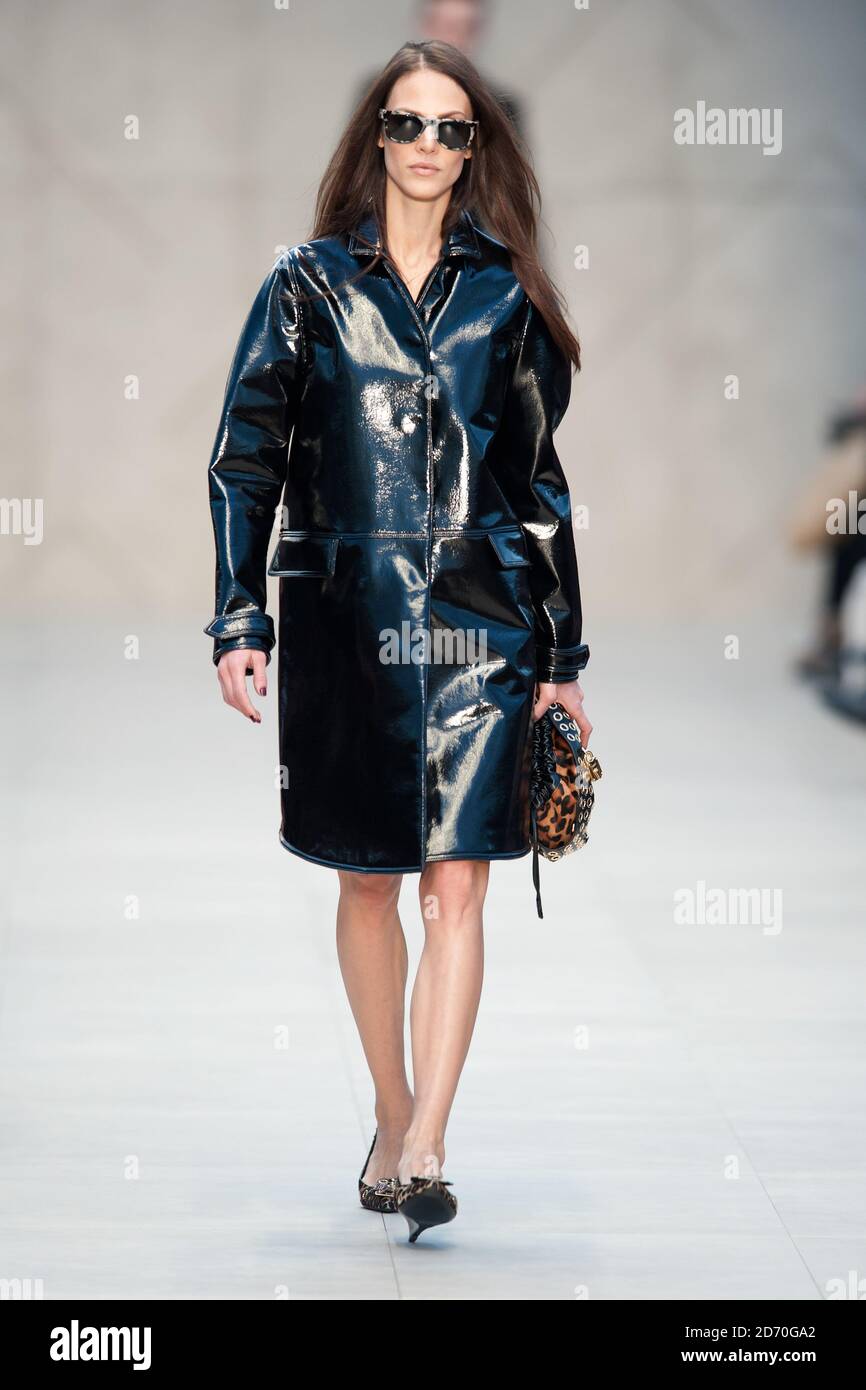 A model wears a creation by Burberry during the autumn/ winter 2013 ...