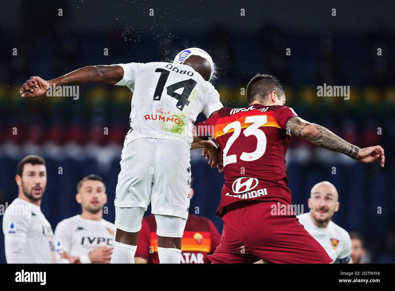 ianluca Mancini of Roma (R) goes for a header with Bryan Dabo of ...
