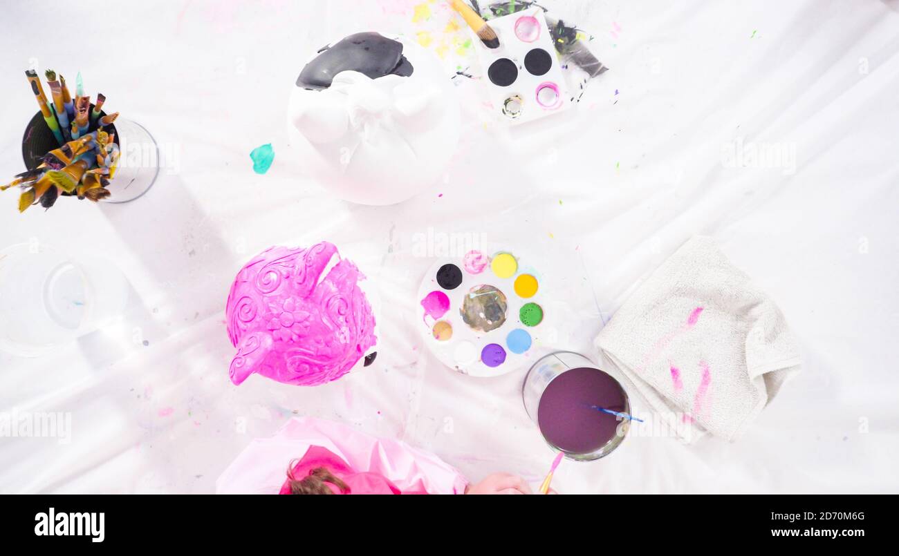 Flat lay. Painting craft pumpkin with acrylic paint for Halloween Stock ...