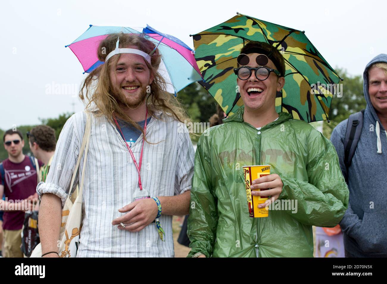 Festival Goers Brave The Rain At Glastonbury Festival At Worthy Farm