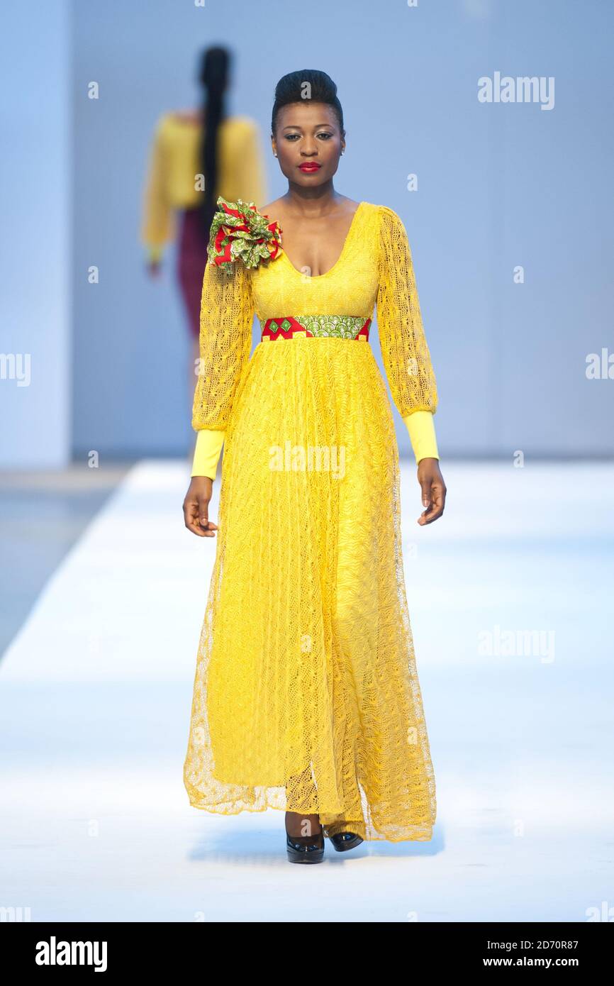 A model wears a design by Ruuts Art and Creation at African Fashion ...