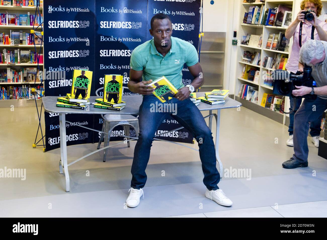 Usain Bolt pictured at Selfridge's in London, as he signs copies of his ...