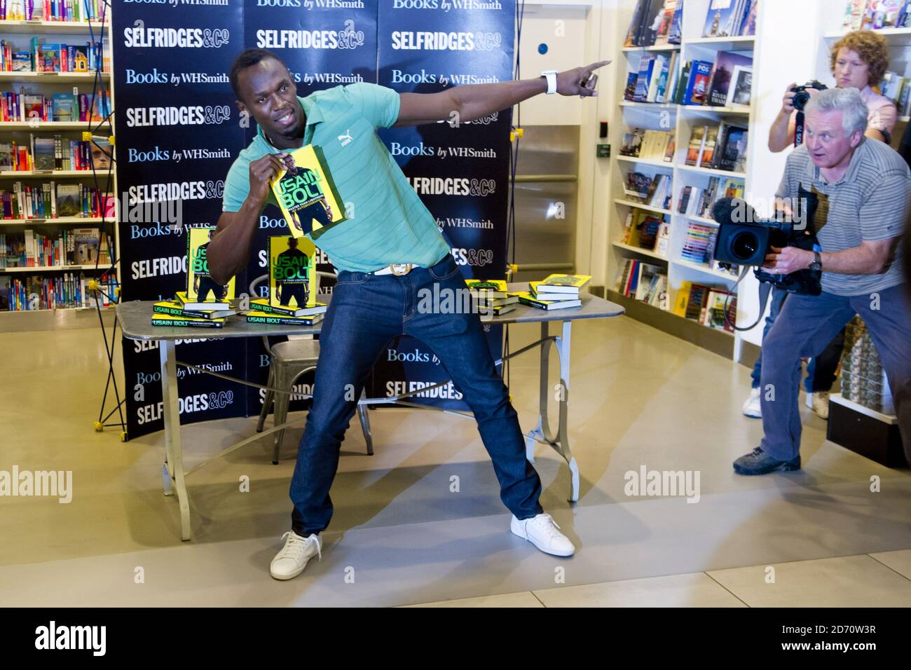 Usain Bolt pictured at Selfridge's in London, as he signs copies of his ...