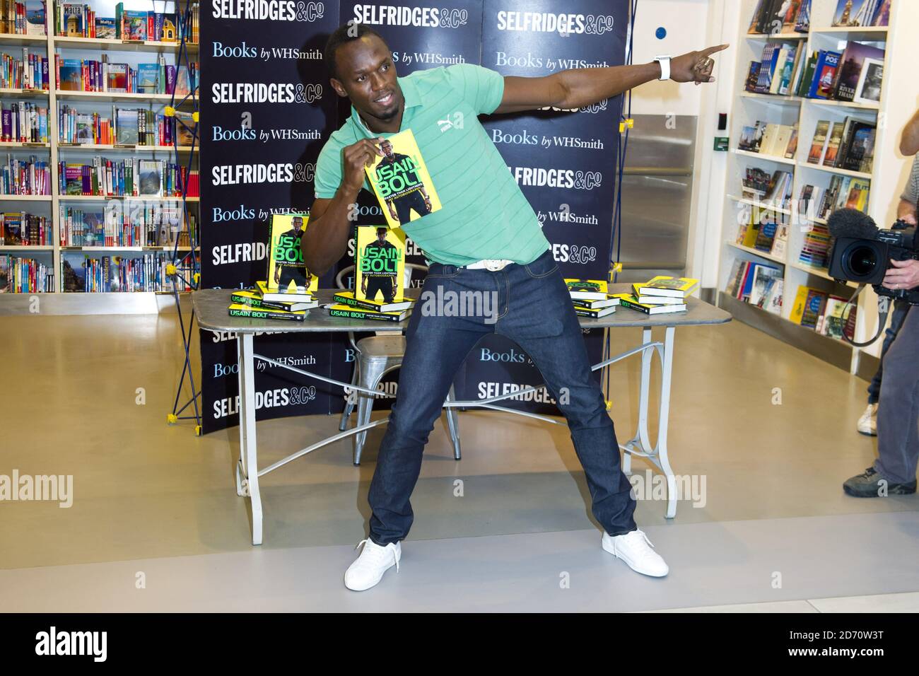 Usain Bolt pictured at Selfridge's in London, as he signs copies of his ...