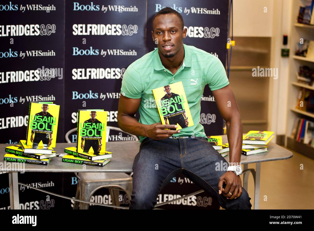 Usain Bolt pictured at Selfridge's in London, as he signs copies of his ...
