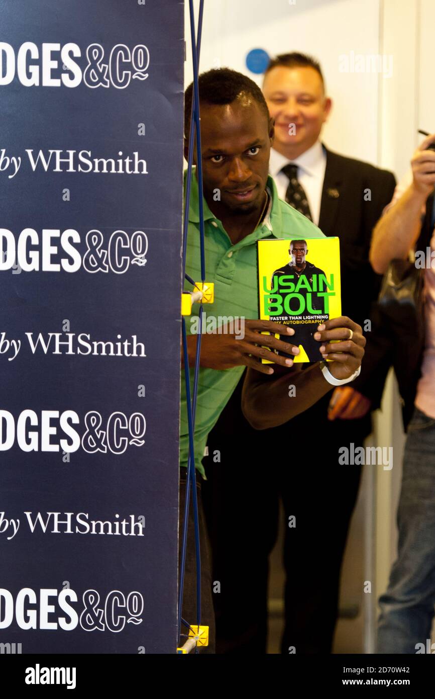 Usain Bolt pictured at Selfridge's in London, as he signs copies of his ...