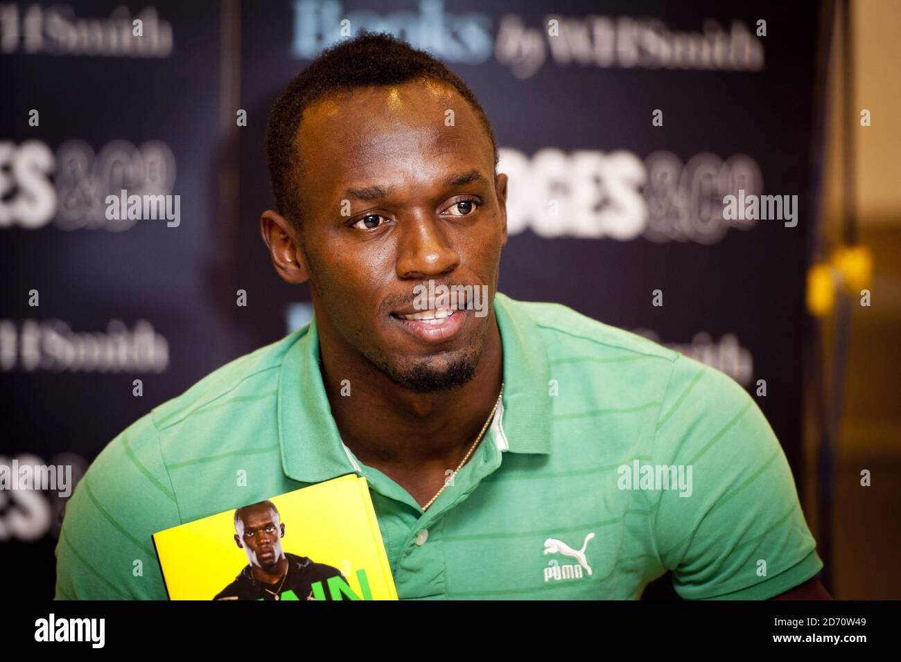 Usain Bolt pictured at Selfridge's in London, as he signs copies of his ...