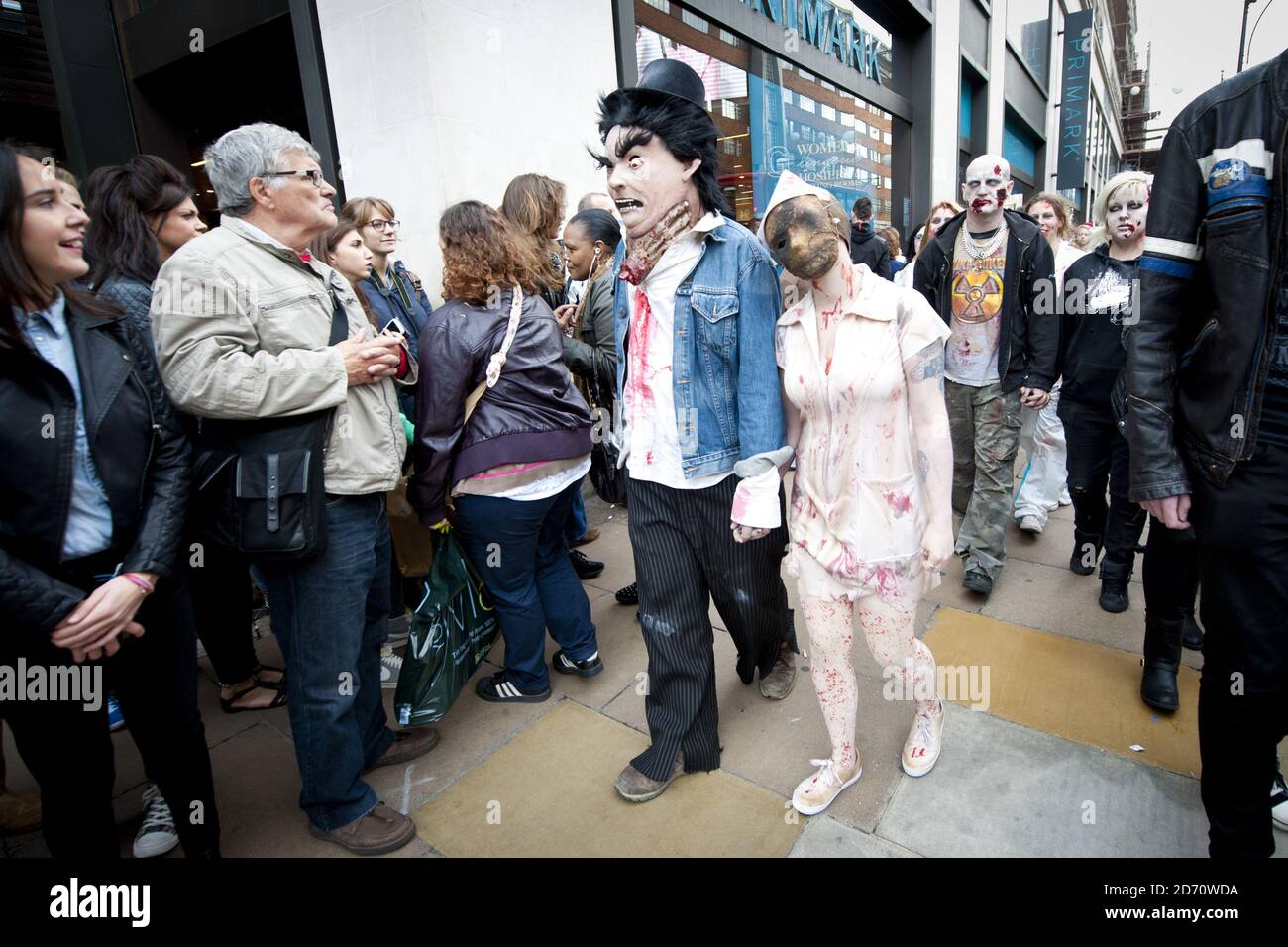 People dressed as zombies parade along Oxford Street, London, as part ...