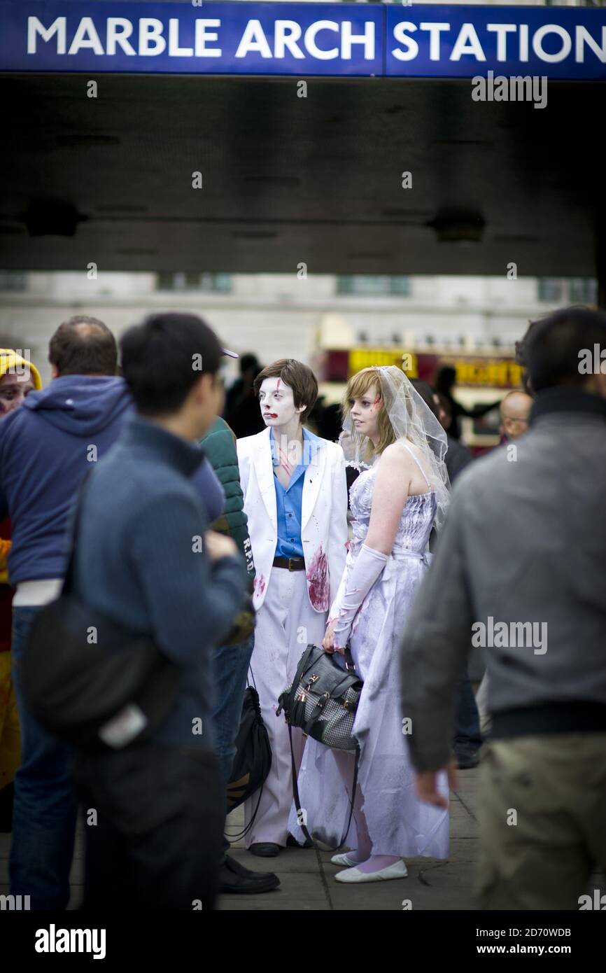 People dressed as zombies parade along Oxford Street, London, as part ...
