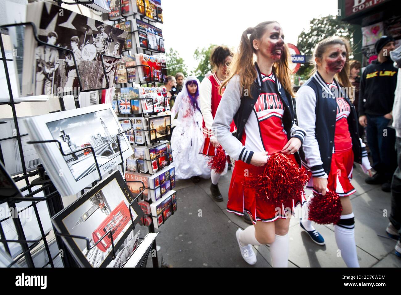 People dressed as zombies parade along Oxford Street, London, as part ...