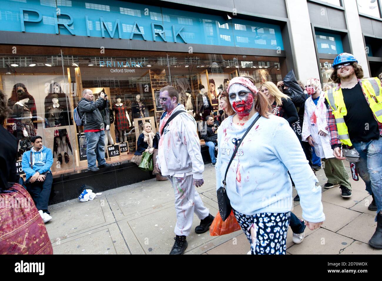 People dressed as zombies parade along Oxford Street, London, as part ...